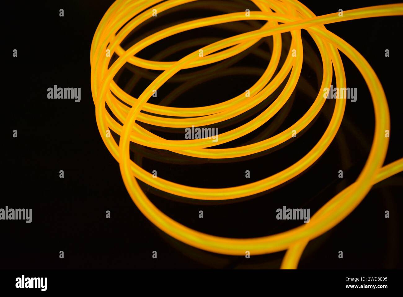 The original yellow lighting of thick electoluminescent wires and lines ...