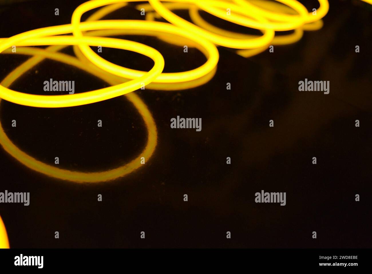 The original yellow lighting of thick electoluminescent wires and lines ...