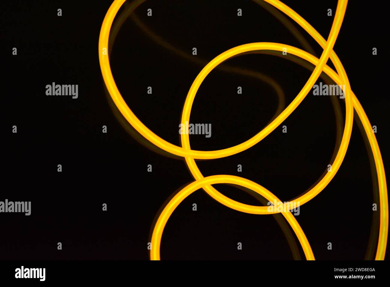 The original yellow lighting of thick electoluminescent wires and lines ...