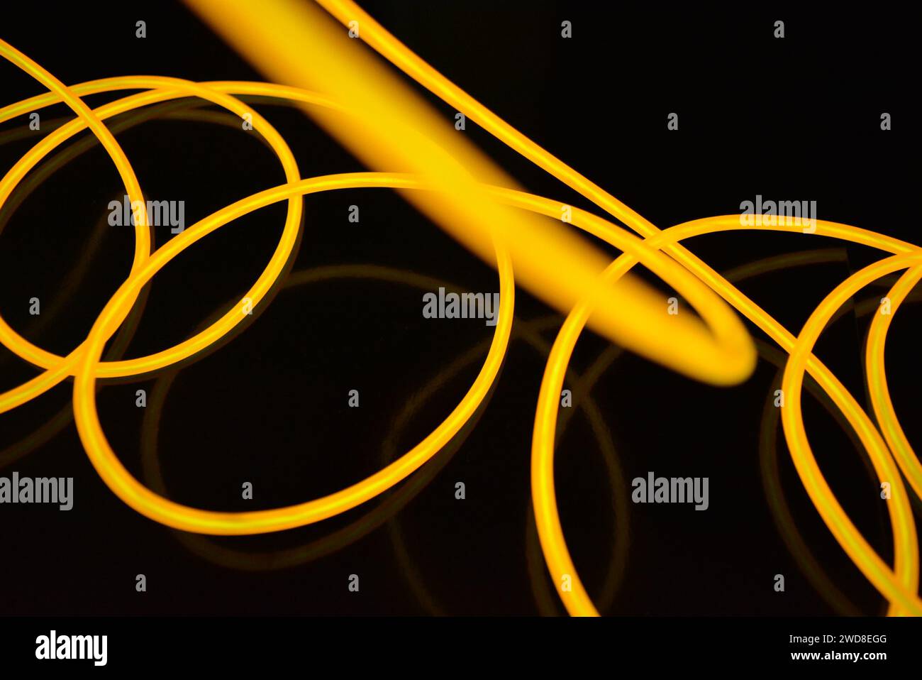 The original yellow lighting of thick electoluminescent wires and lines ...