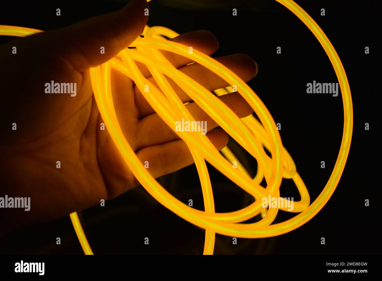 The original yellow lighting of thick electoluminescent wires and lines ...