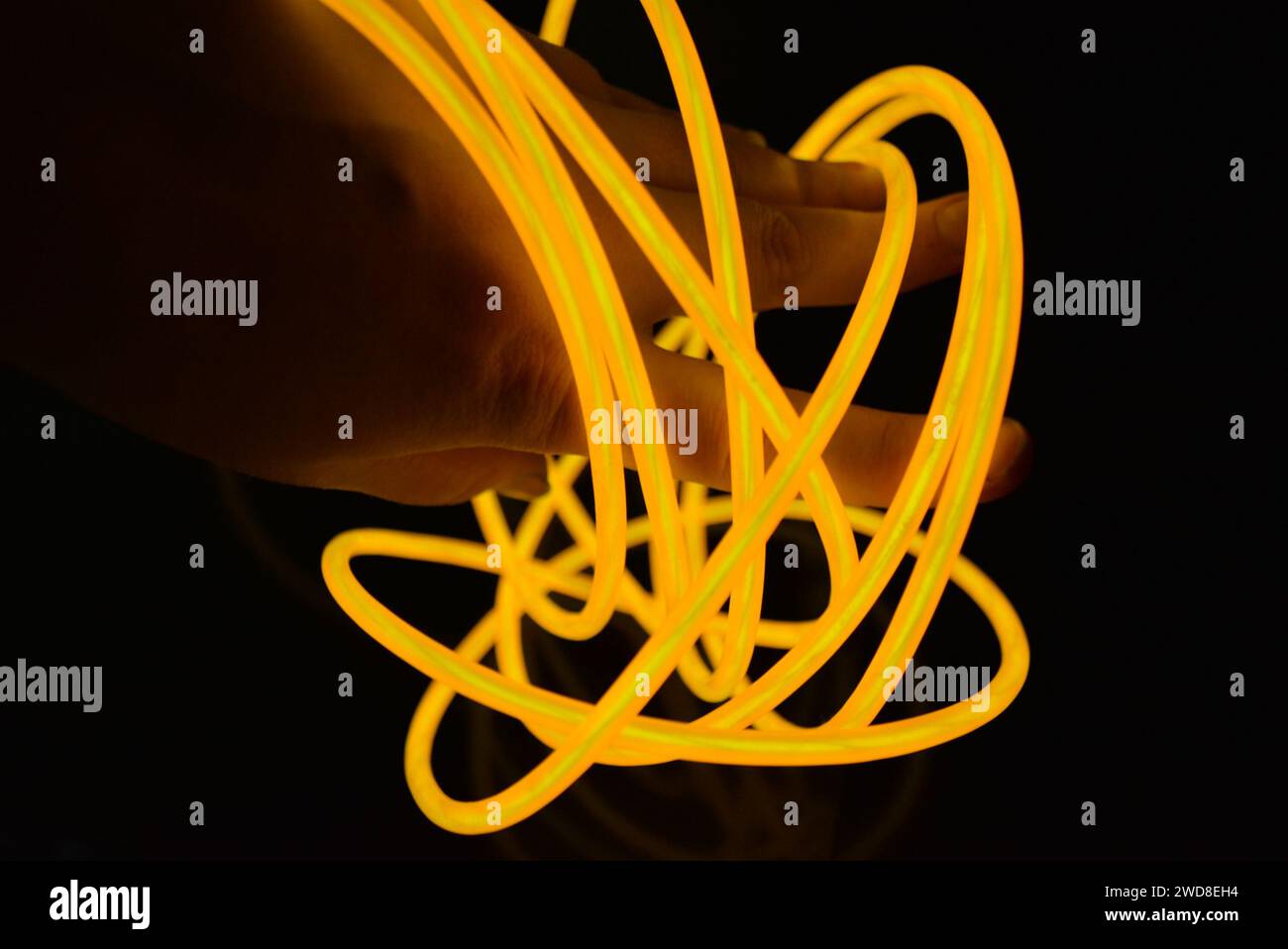 The original yellow lighting of thick electoluminescent wires and lines ...