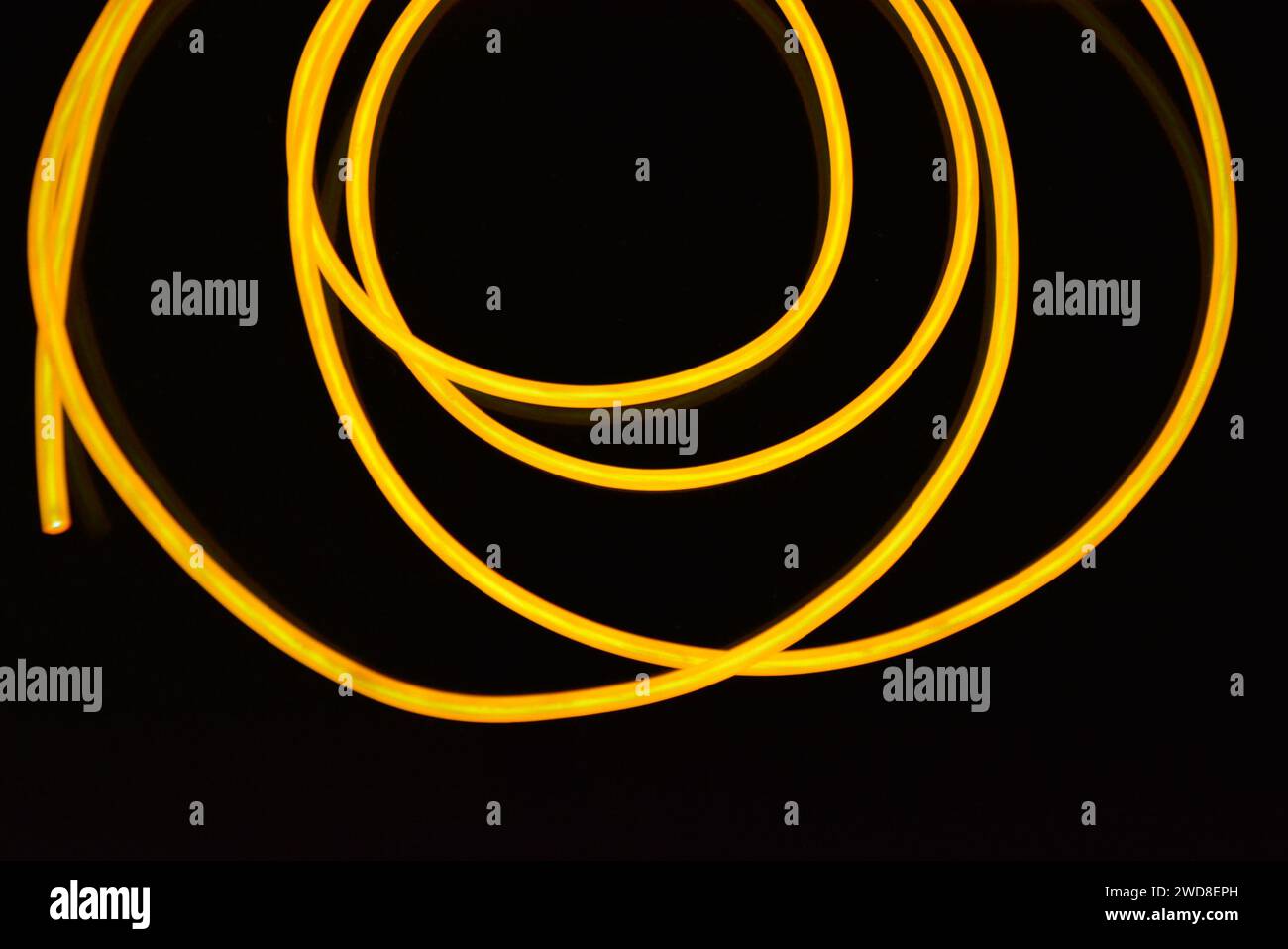 The original yellow lighting of thick electoluminescent wires and lines ...