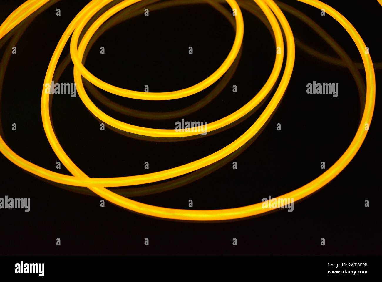 The original yellow lighting of thick electoluminescent wires and lines ...