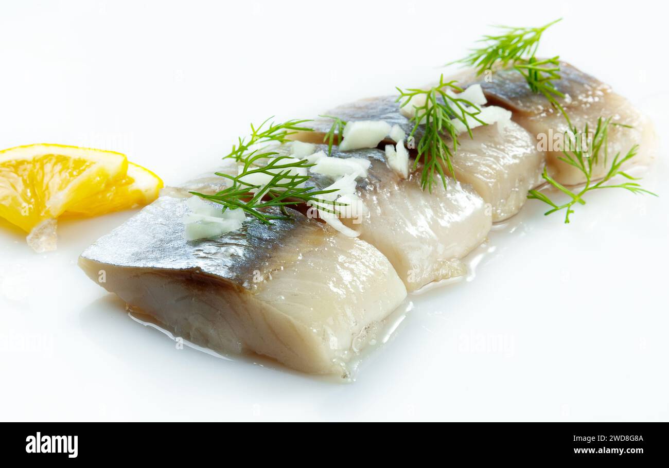 fillet herring isolated white background Stock Photo - Alamy