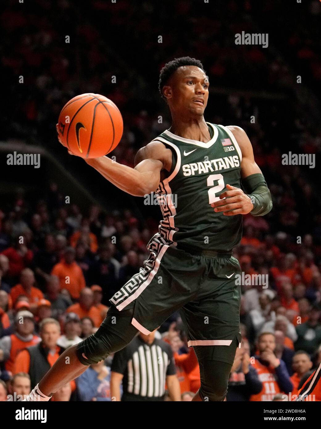 Michigan State's Tyson Walker passes during an NCAA college basketball ...