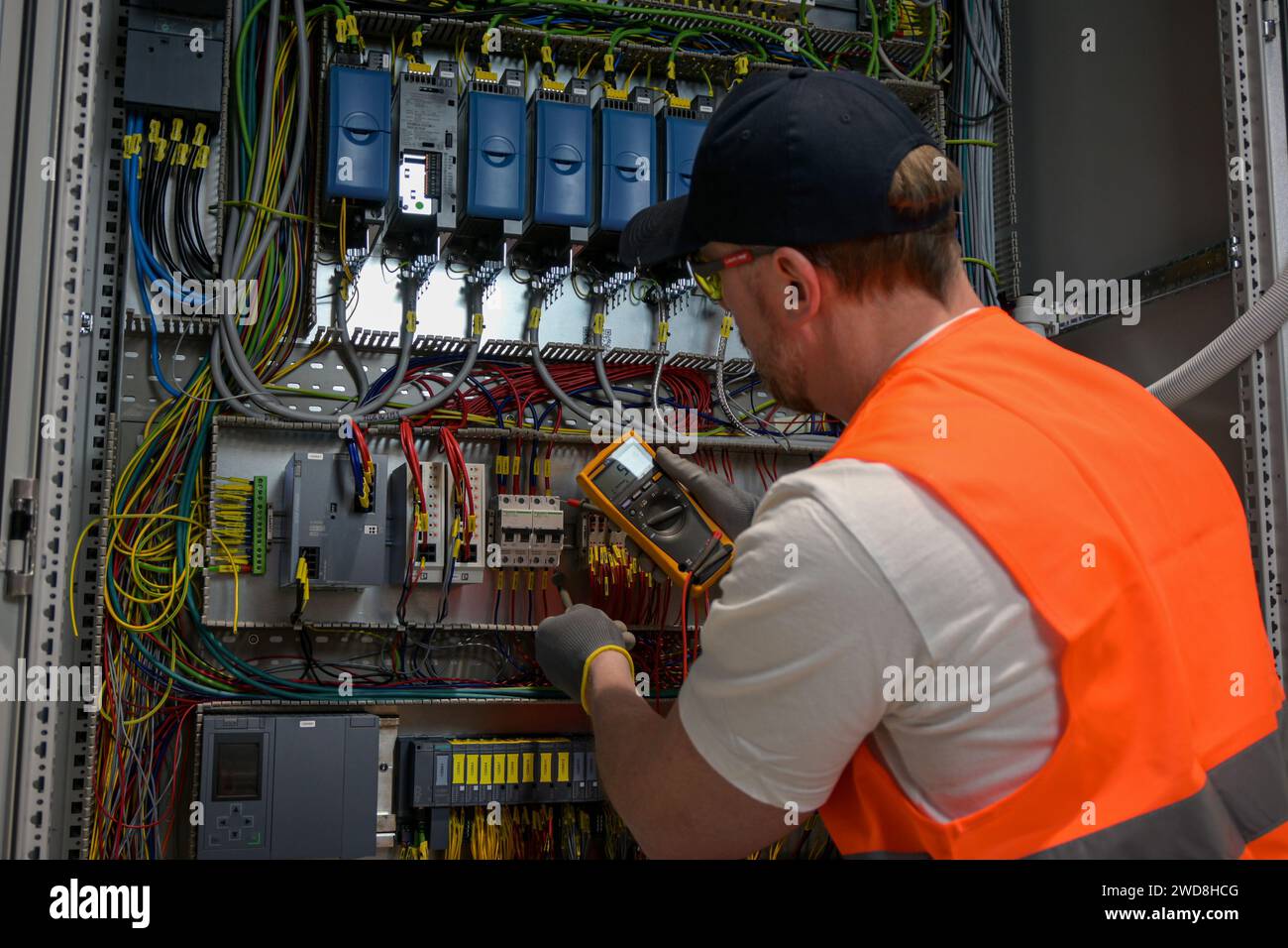 Person working on electrical box hi-res stock photography and images ...