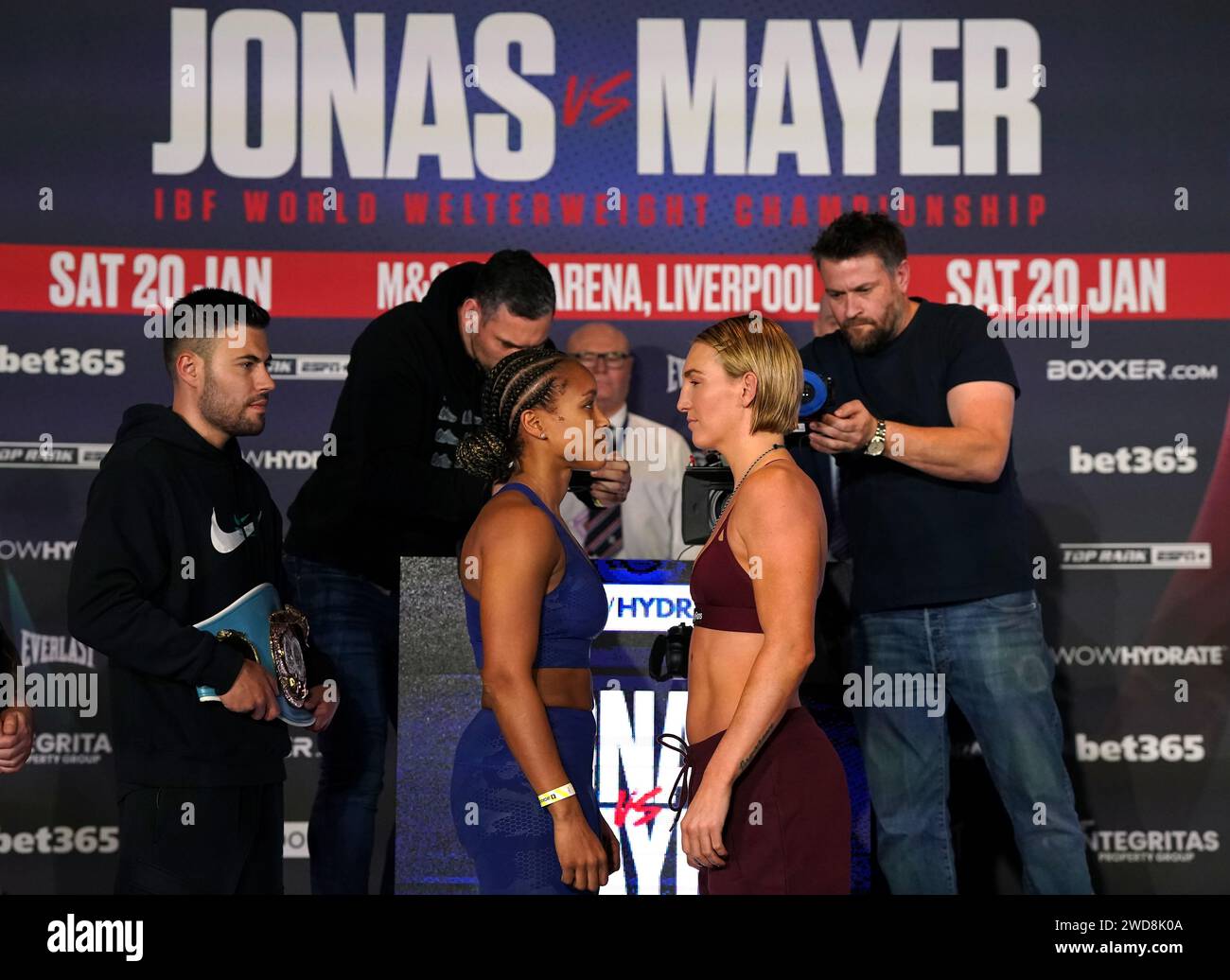 Natasha Jonas and Mikaela Mayer (right) during a weigh-in at the ...