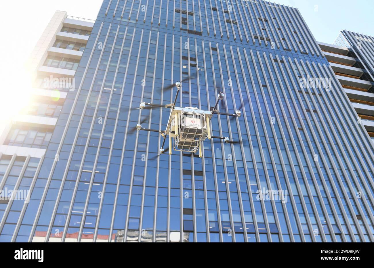 Shenzhen, China's Guangdong Province. 19th Jan, 2024. A drone carrying ...