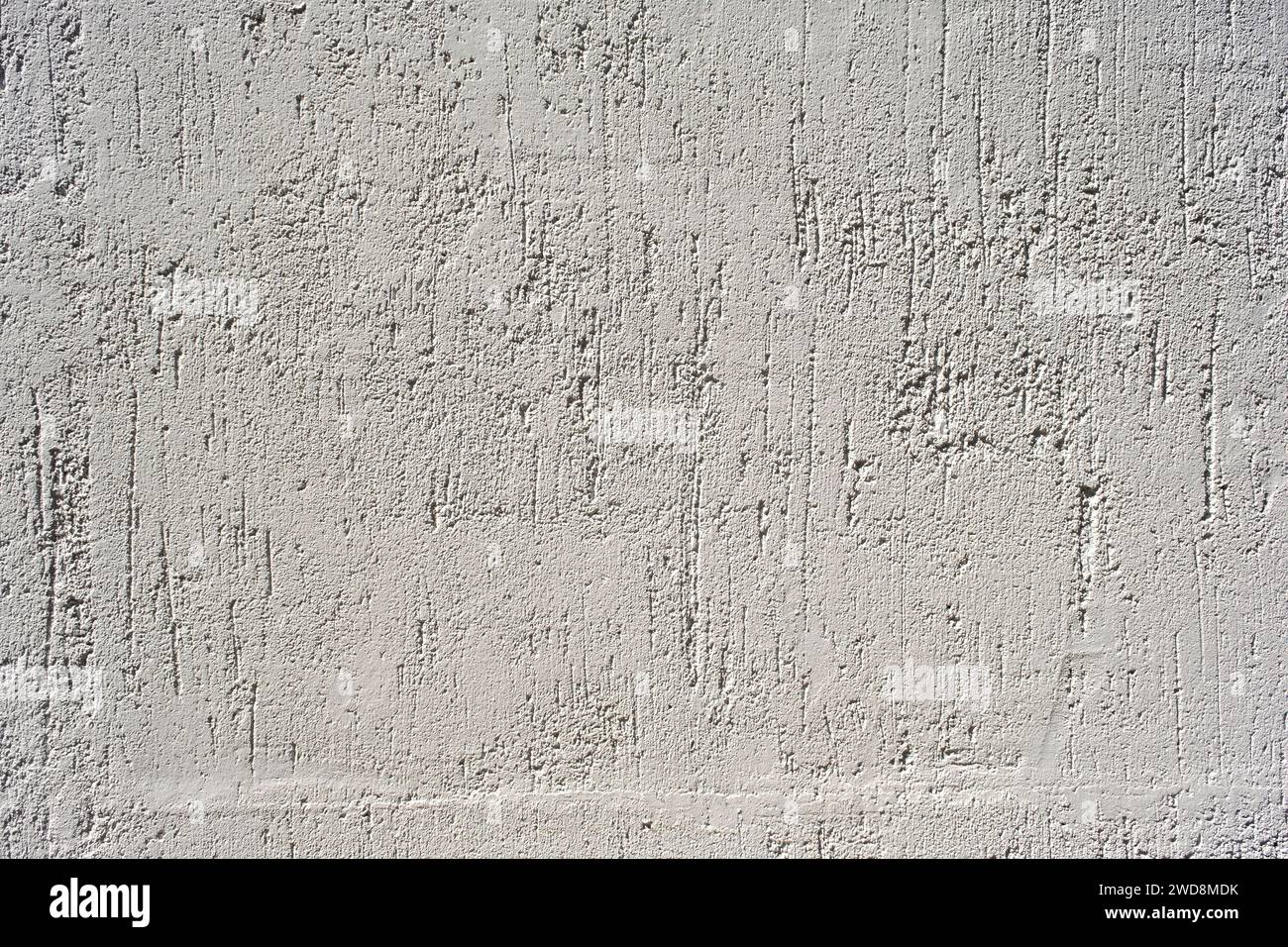 Detail of white scrapped plaster finish wall texture Stock Photo - Alamy