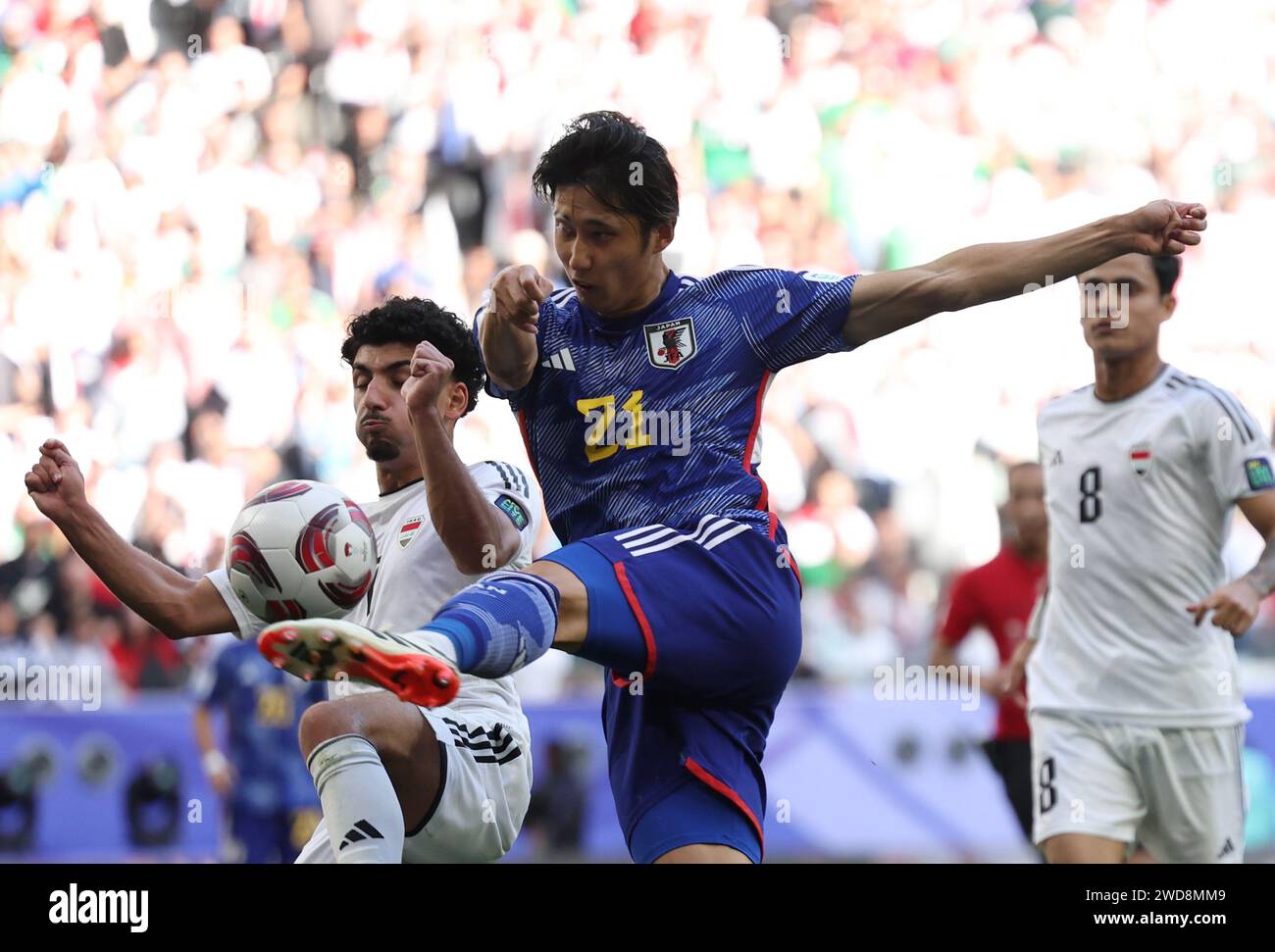 Doha, Qatar. 19th Jan, 2024. Japan's Ito Hiroki (C) shoots during the ...