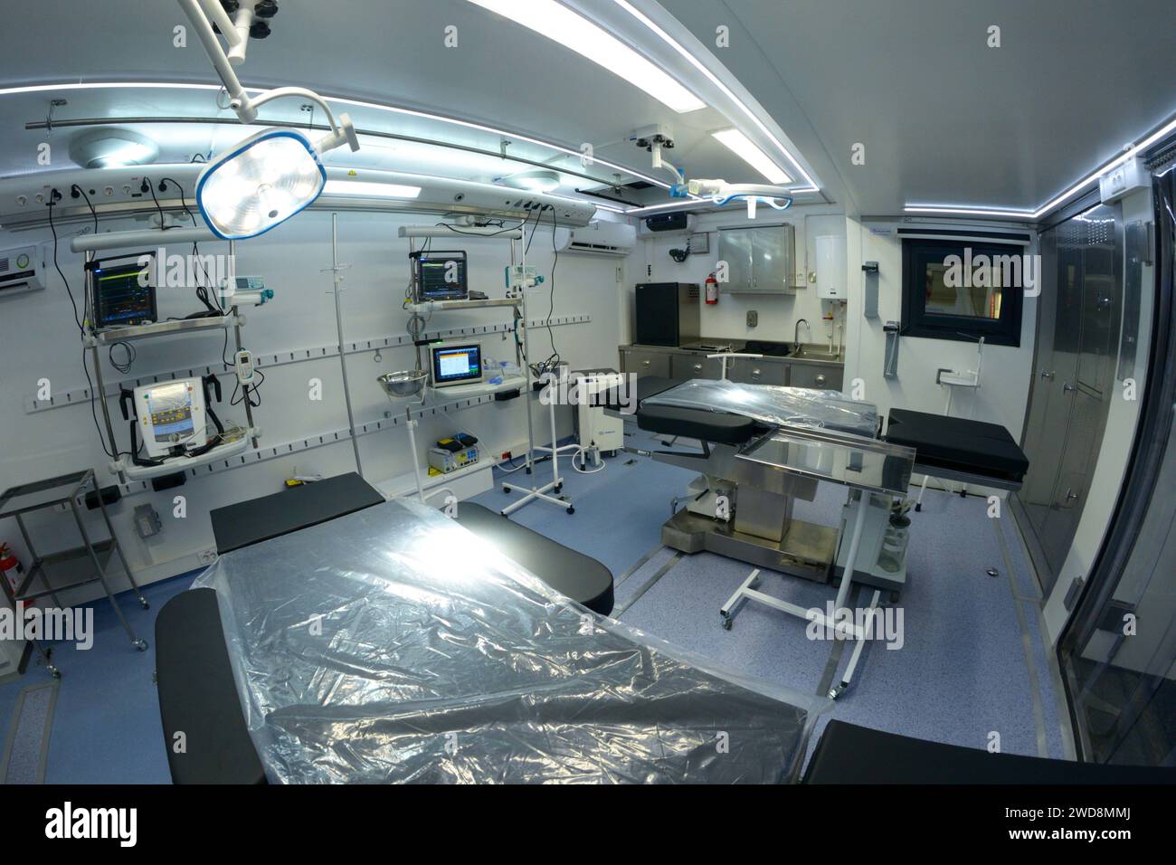 Interior of a modern military mobile hospital operation tables ...