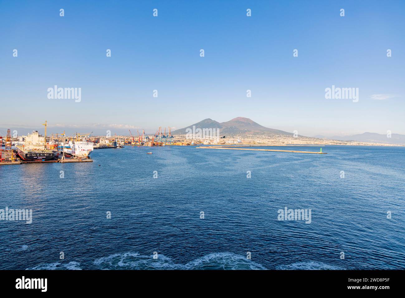 Photograph taken in Naples, Italy, featuring a view of Mount Vesuvius ...