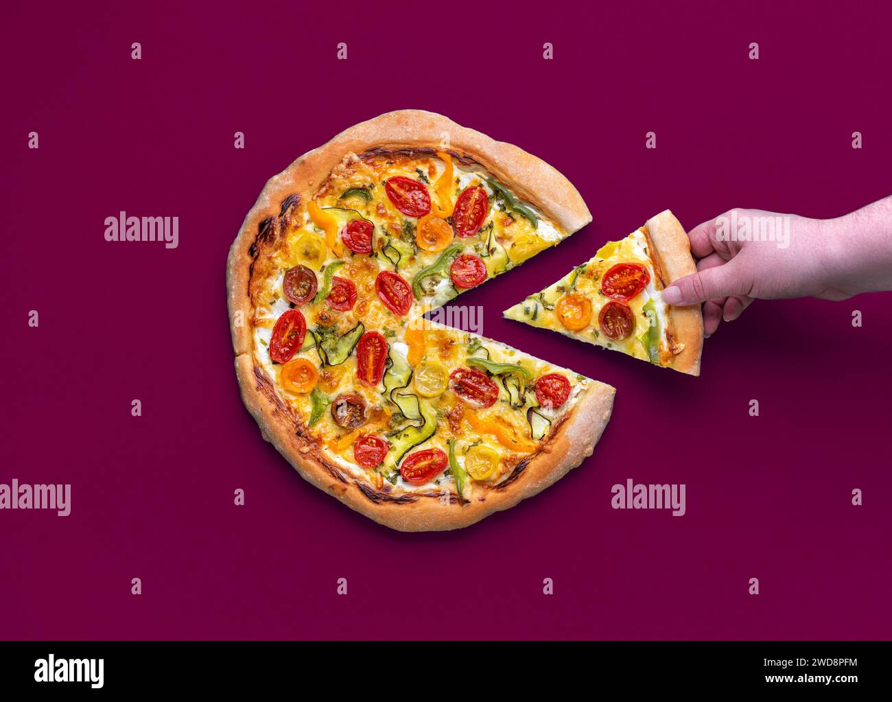 Top view with a delicious vegetarian pizza isolated on a magenta ...