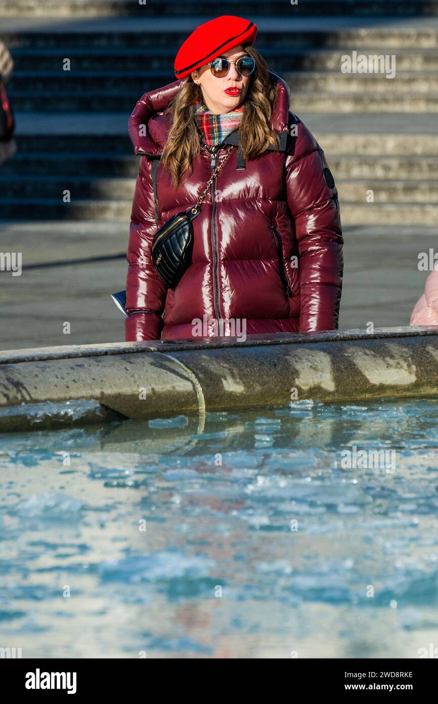 London, UK. 19th Jan, 2024. Tourists enjoy the frozen fountains as ...