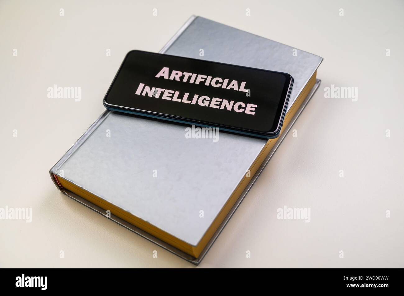 Book and device with text Artificial Intelligence. Learning, use, tools and data processing of ...