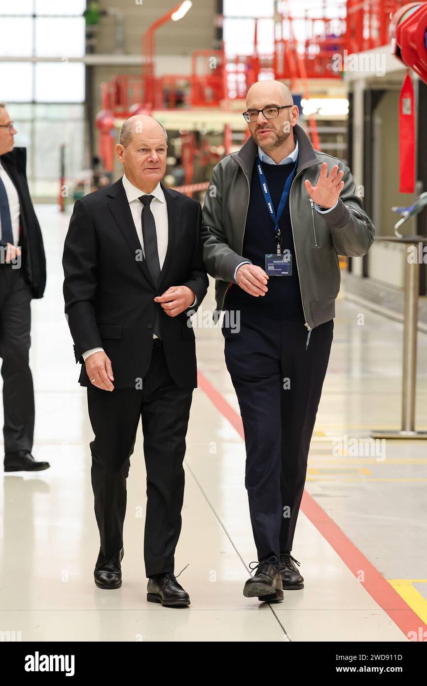 Manching, Germany. 19th Jan, 2024. Chancellor Olaf Scholz (SPD, l ...