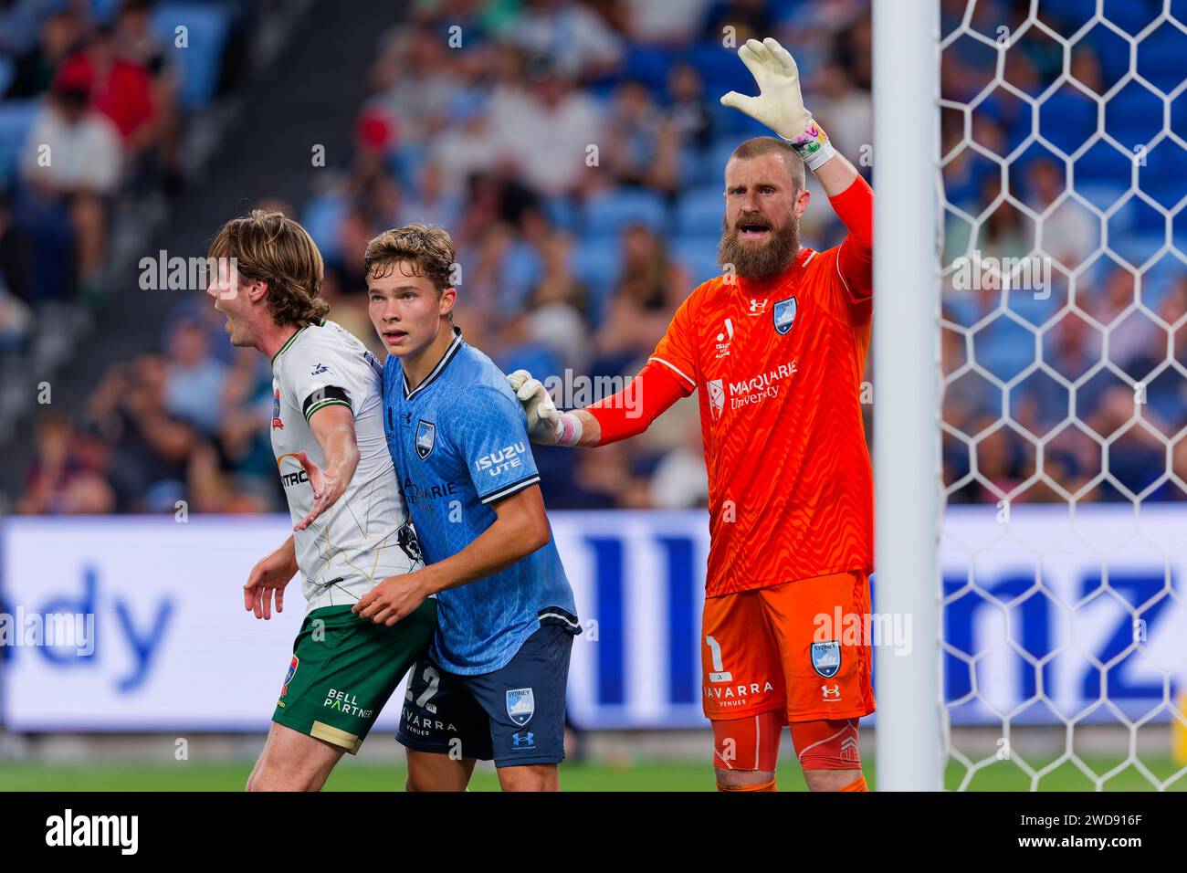 Sydney, Australia. 19th Jan, 2024. Corey Hollman of Sydney marks Callum ...