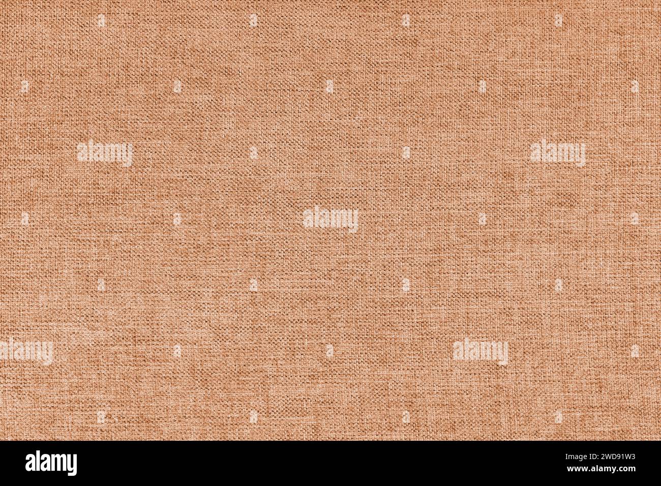 Textile background, orange coarse fabric texture, cloth structure close ...