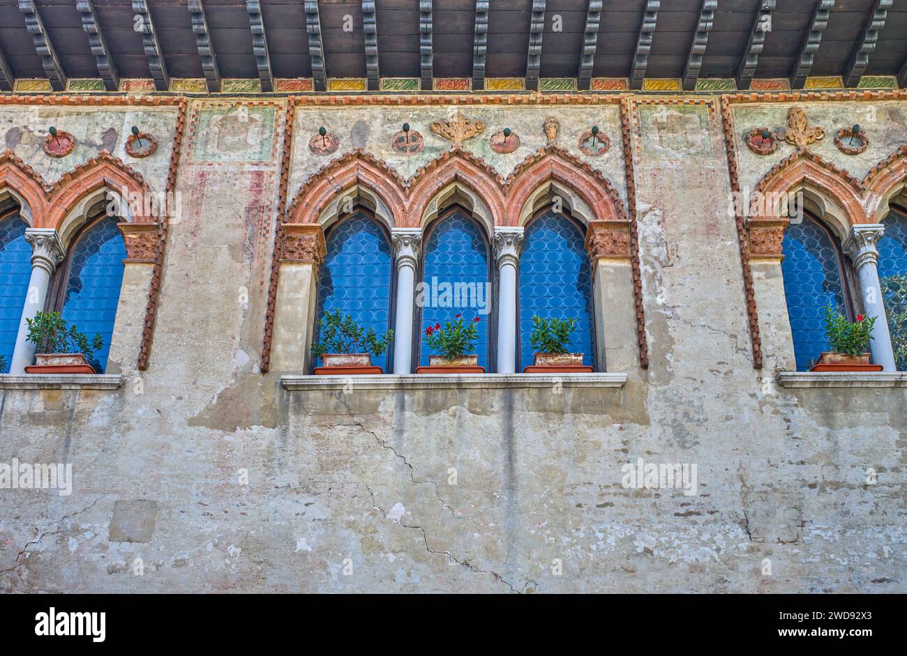Treviso, Italy, the three-lancet windows of aa medieval house in the ...