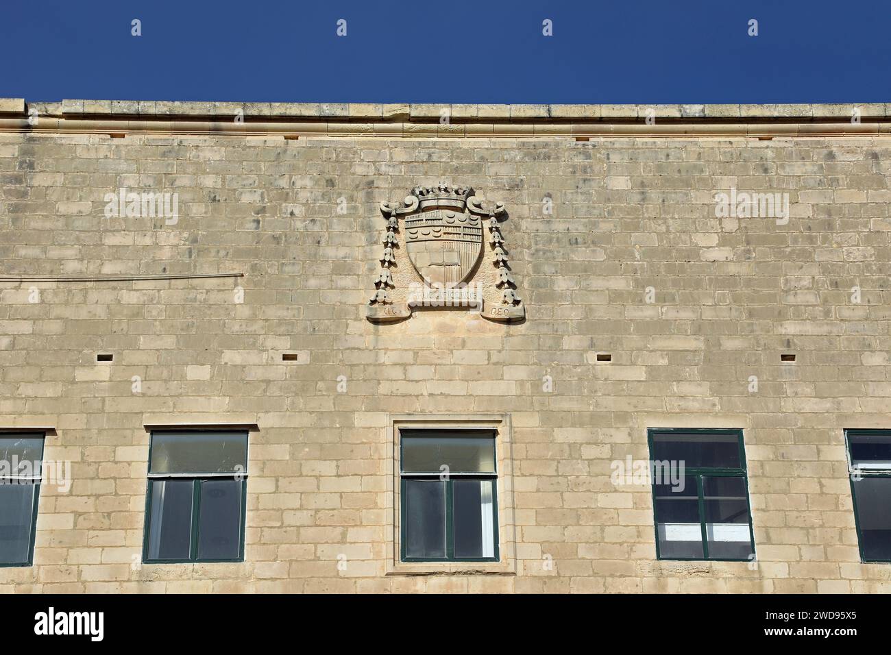 Coat of Arms of Malta University on the 1950s Evans Building in ...