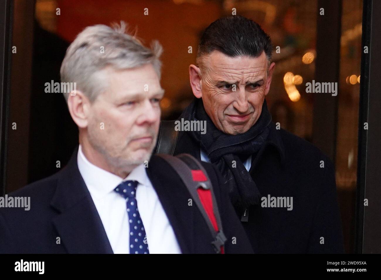 Fujitsu's European boss Paul Patterson (right) leaves Aldwych House ...