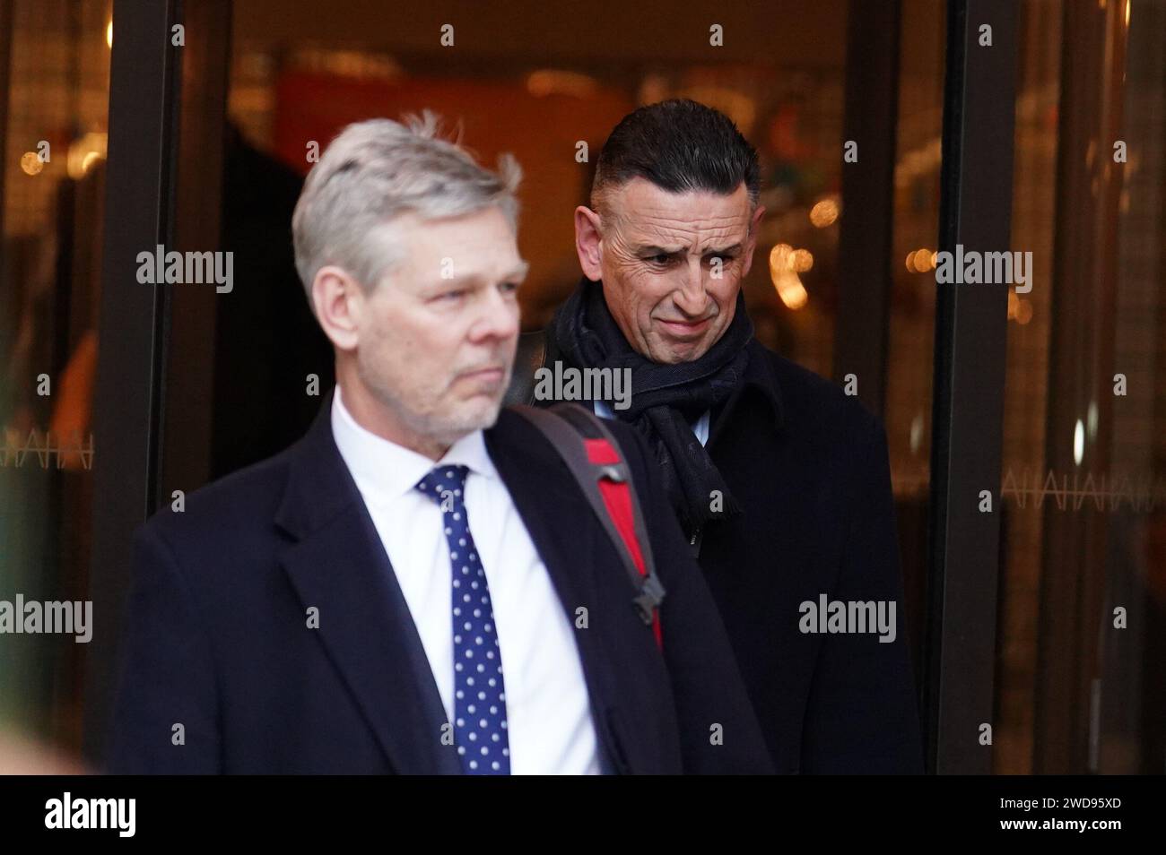 Fujitsu's European boss Paul Patterson (right) leaves Aldwych House ...