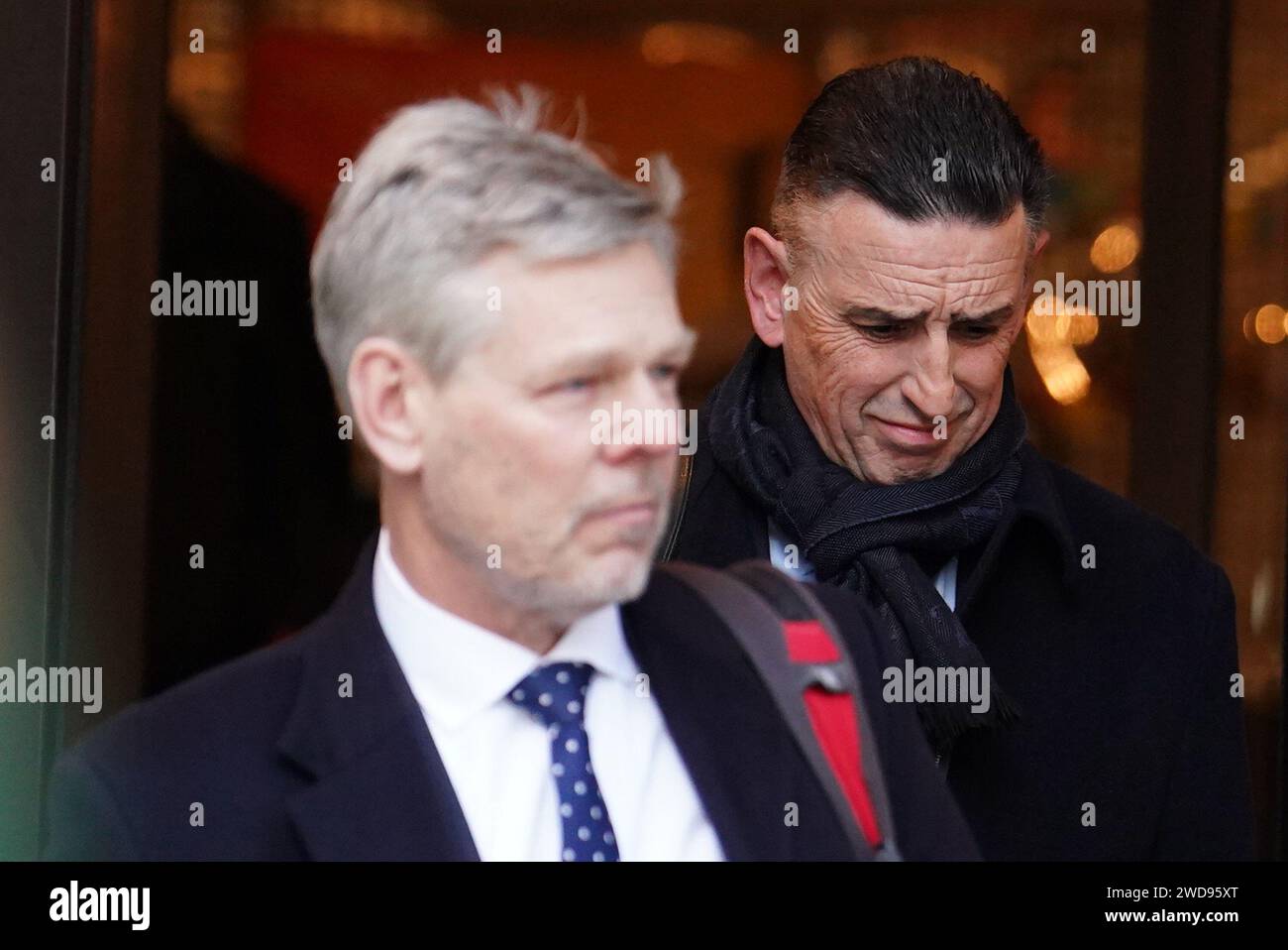 Fujitsu's European boss Paul Patterson (right) leaves Aldwych House ...