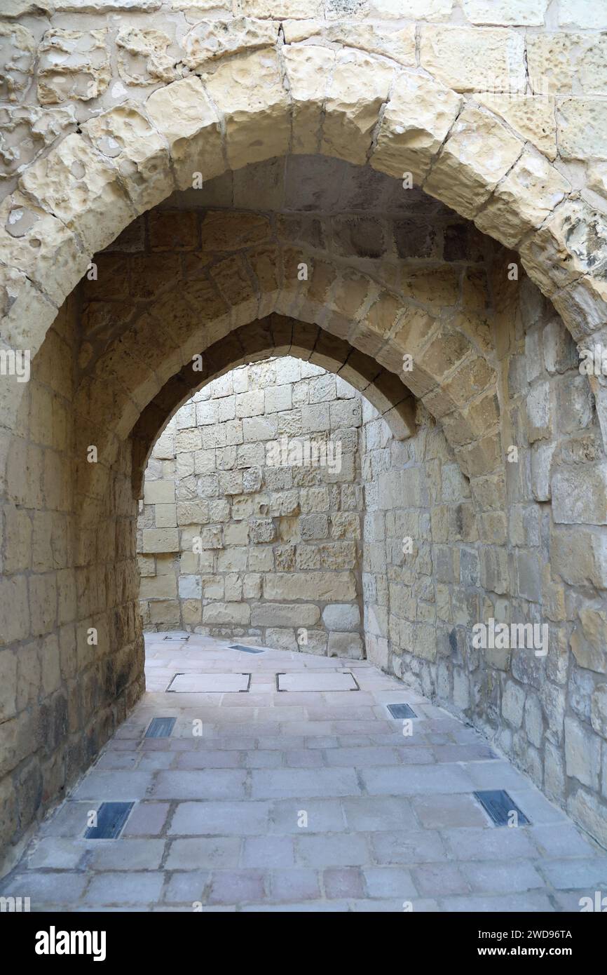 Three equilateral pointed arches at the cidadel in Gozo Stock Photo - Alamy