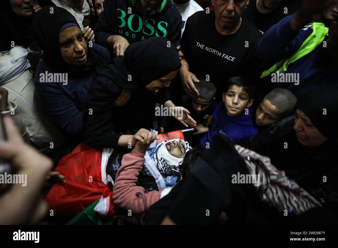 Tulkarm, Palestinian Territories. 19th Jan, 2024. Relatives mourn ...