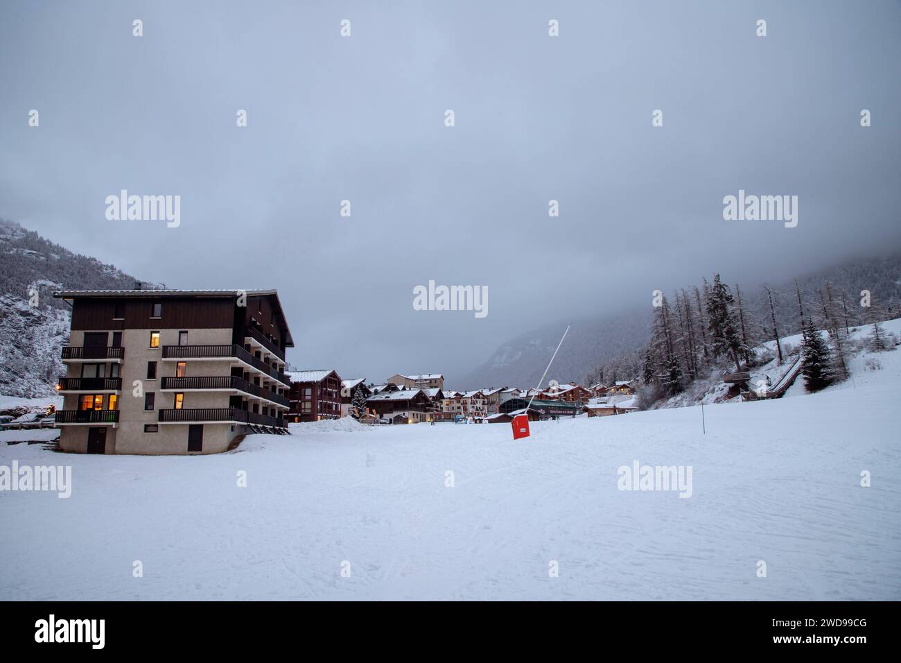 Winter view of apartment buildings in the ski resort of Val Cenis ...