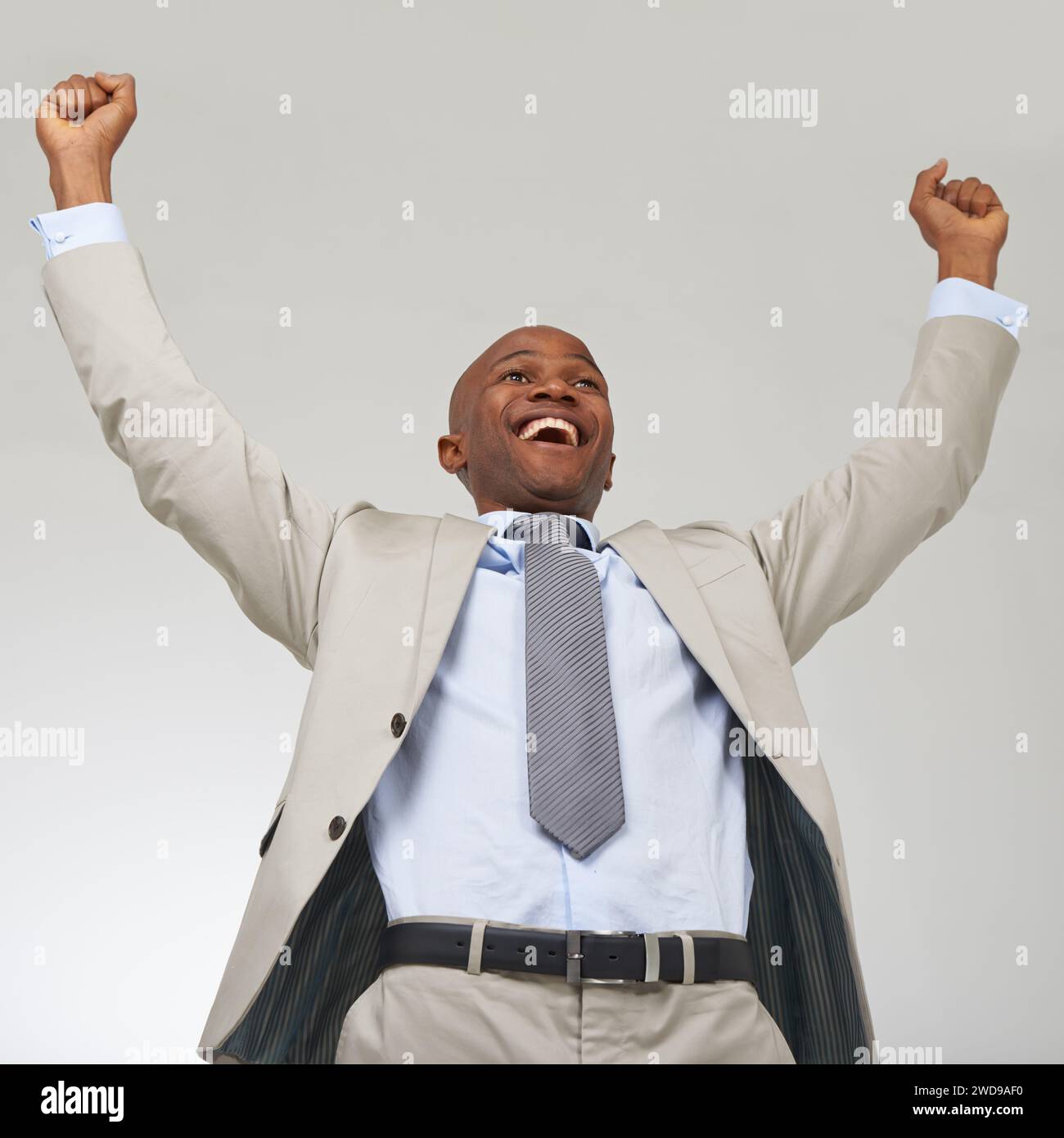 Black man, cheering and employee with celebration, winner and worker on ...