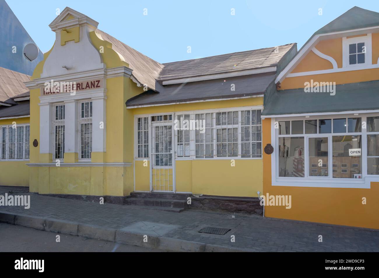 cityscape with picturesque old yellow building at historical town ...