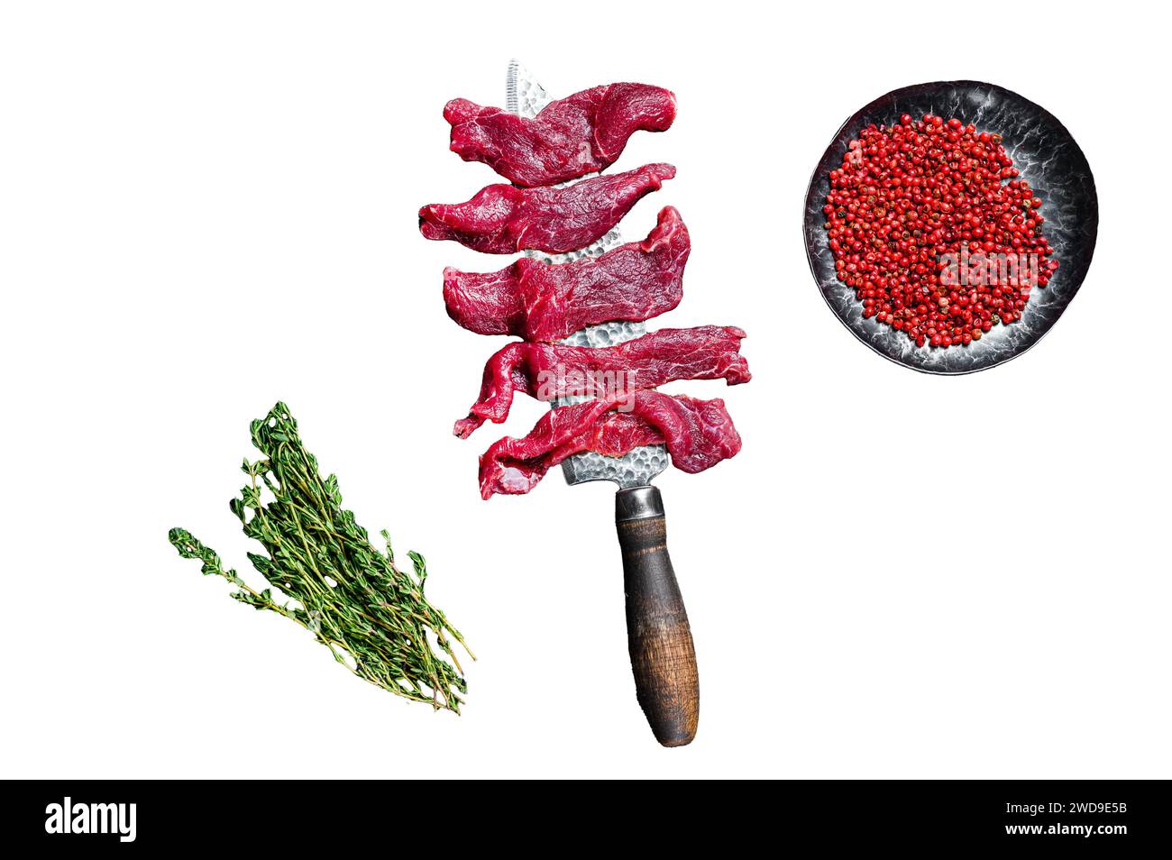 Fresh beef marbled meat cut into thin strips for goulash. Isolated on ...