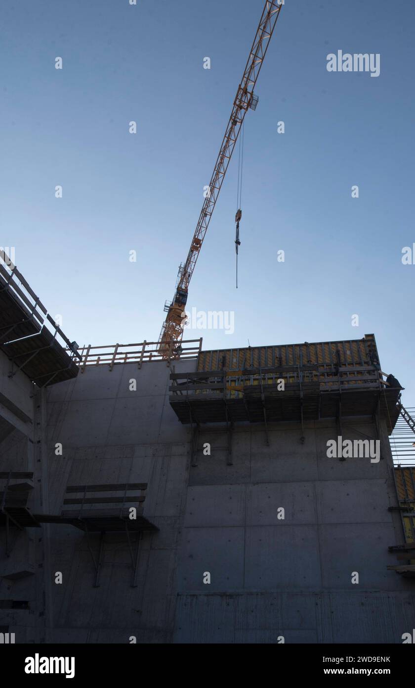 Construction crane in building industry, heavy machine at construction ...