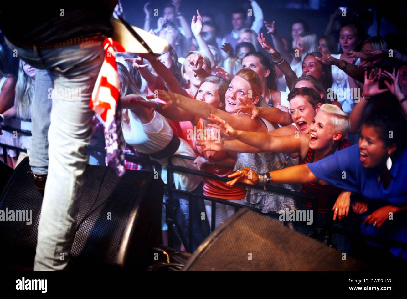 Music festival, stage and fans of musician at performance, event and ...