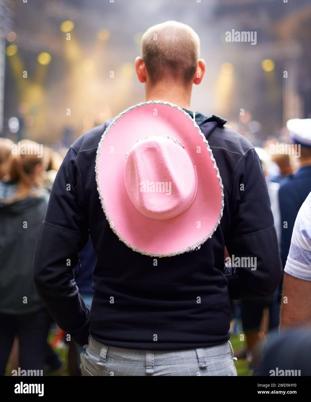 Man, crowd and music festival event audience or cowboy hat, rave outfit ...