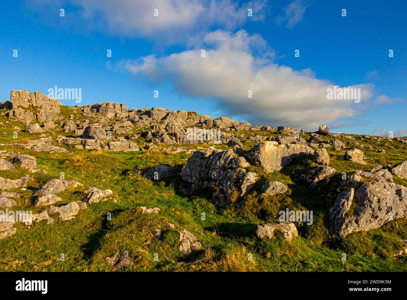 Limestone landscape with blue sky and clouds above at High Edge near ...