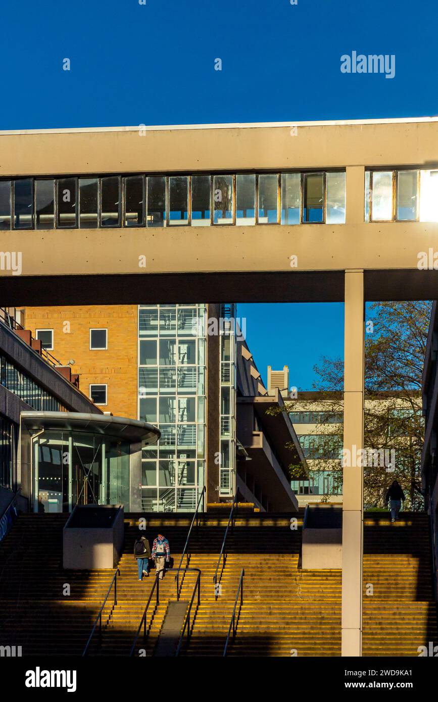 Concrete walkway with steps below in Brutalist style on the city centre ...