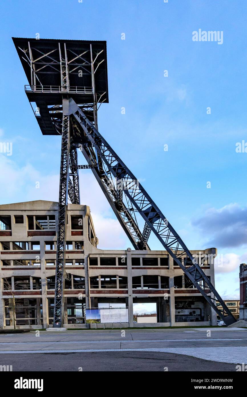 Disused shaft tower of former Waterschei coal mine against blue sky ...