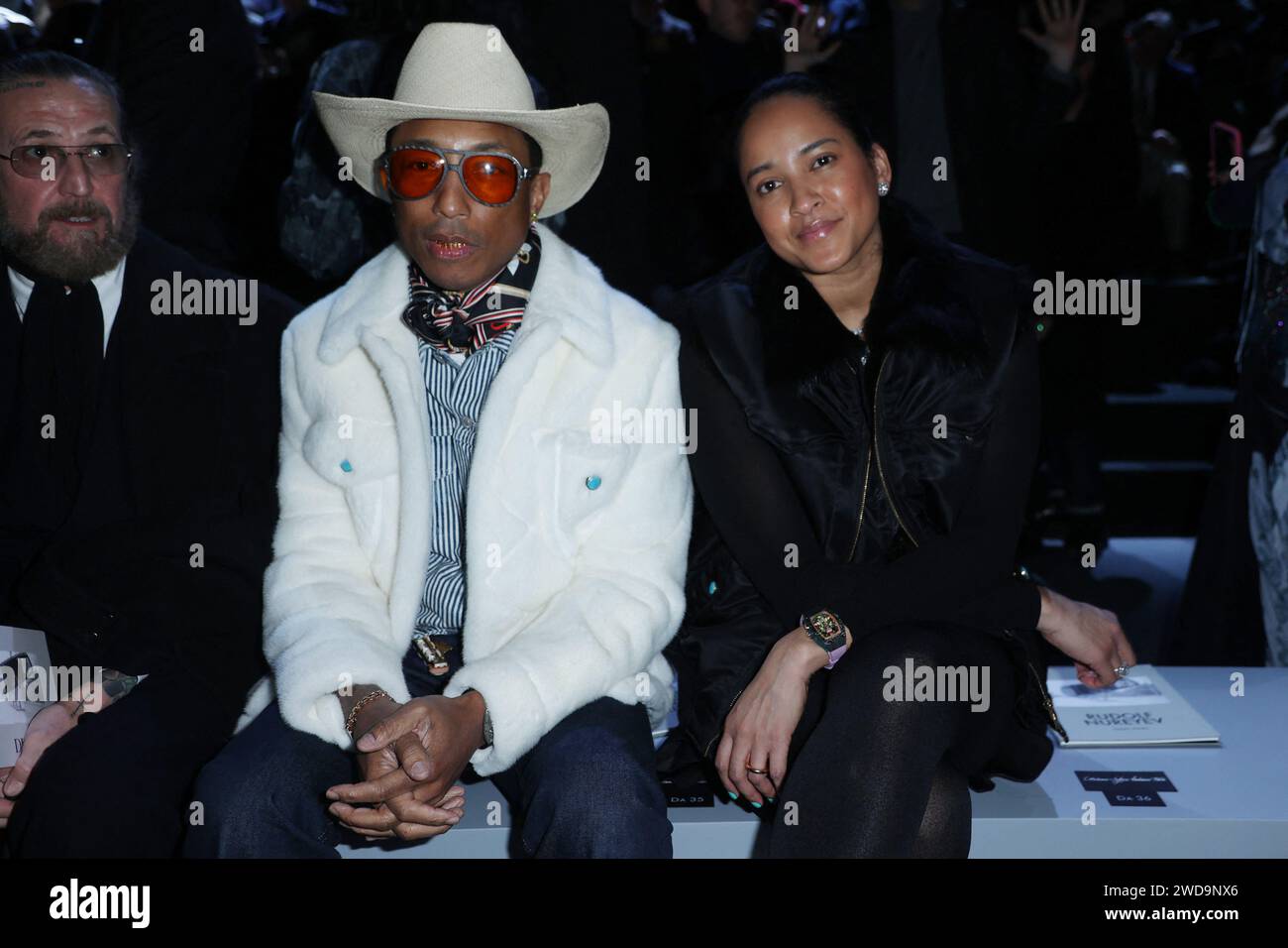 Pharrell Williams and his wife Helen Lasichanh attends Dior fashion ...