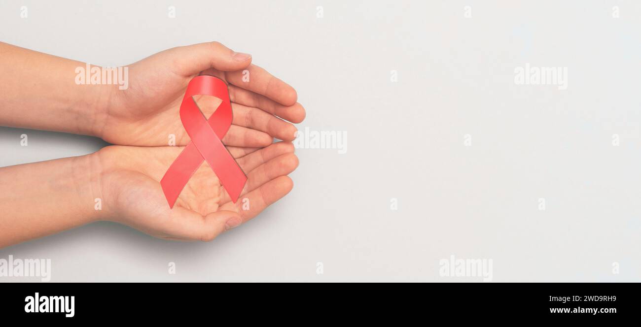 Man holding cancer awareness ribbon. National cancer survivors month ...