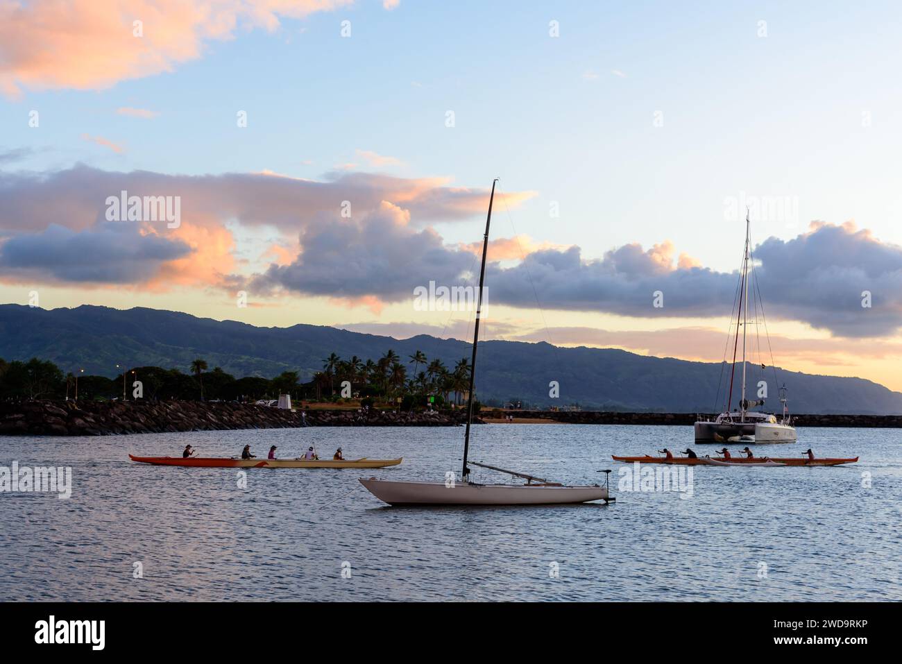Boats in a natural harbour, located on the north shore of Oahu, Hawaii ...
