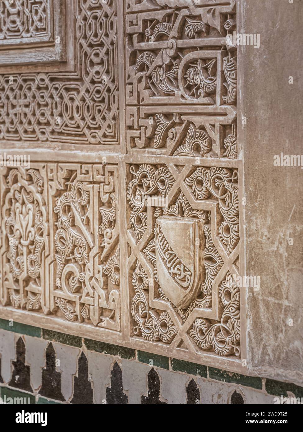 Shield of the Nazari kingdom of Granada. Arabic stone engravings on the ...