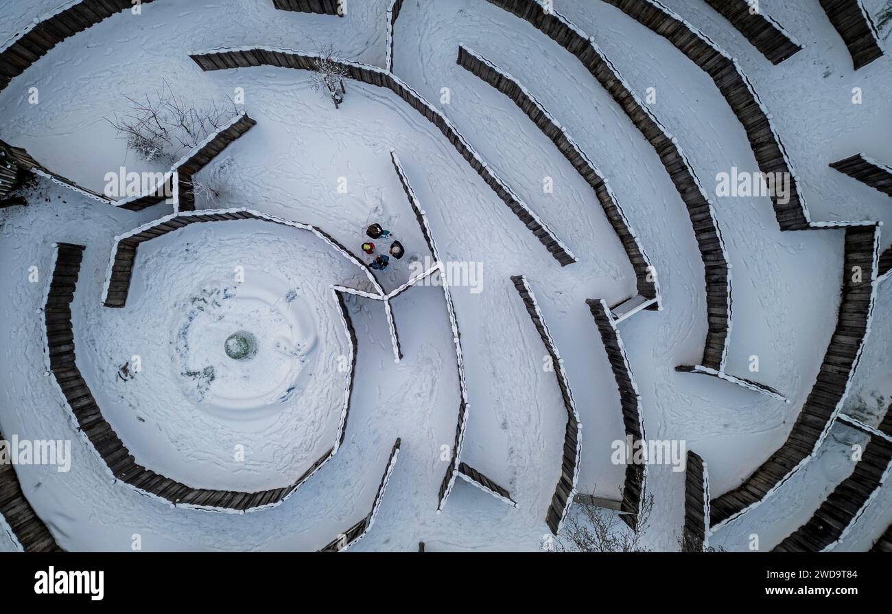 The labyrinth in the Goetheturm forest play park stands out in the snow ...