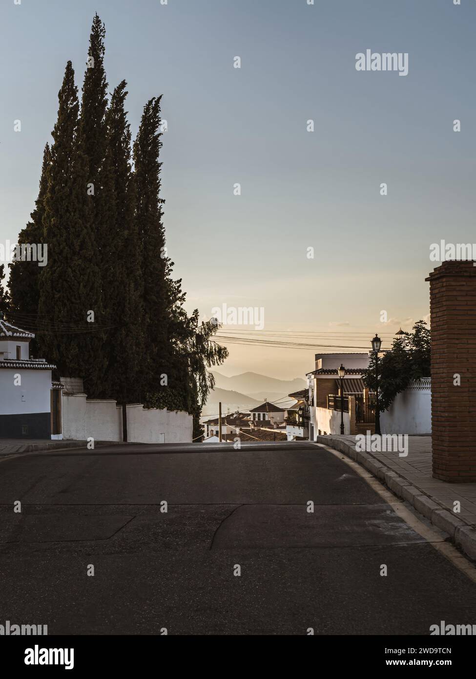 Empty road close to sunset in the Albaicin district of Granada ...