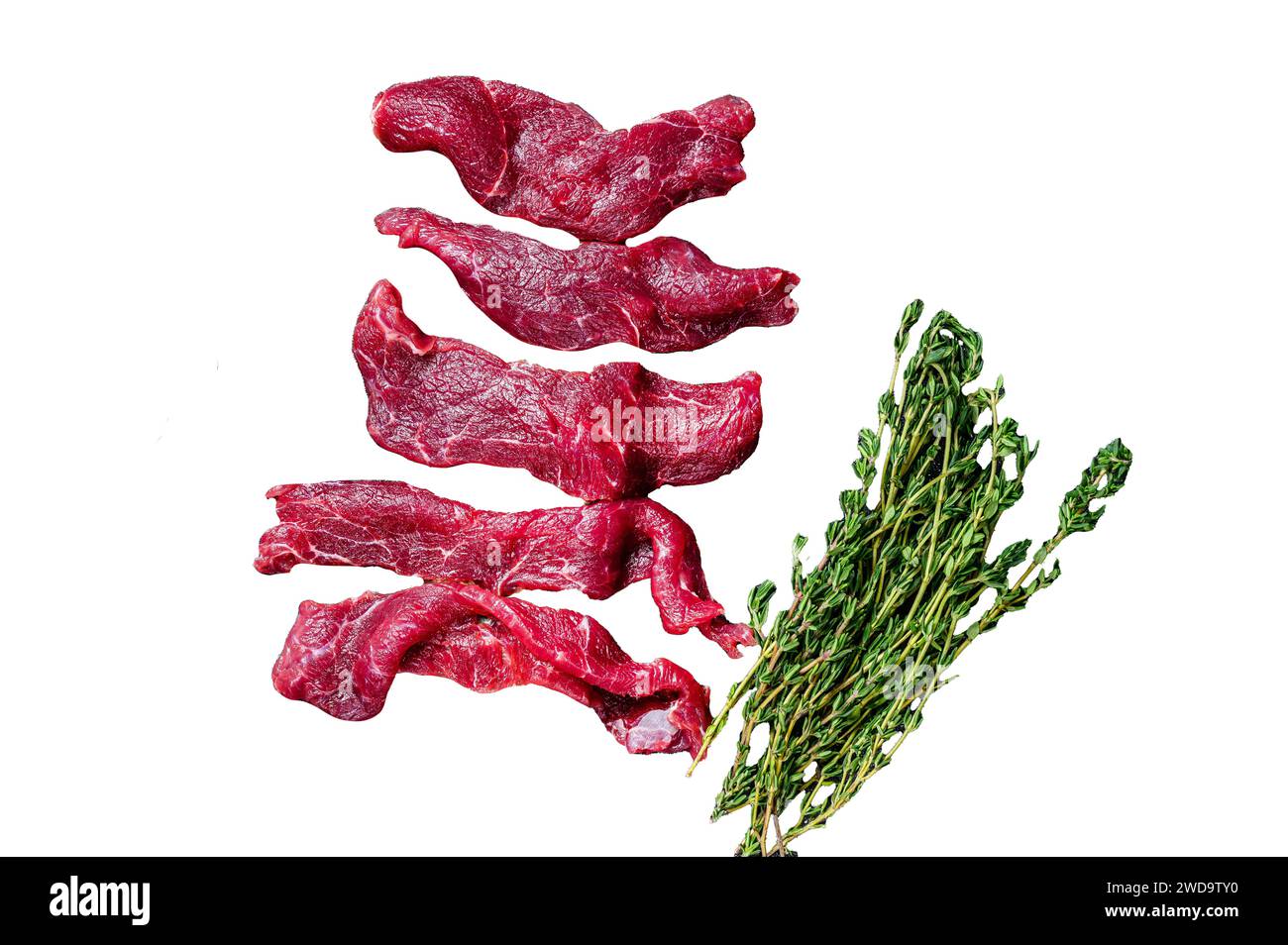 Raw marbled meat cut into thin strips for beefstroganoff. Isolated on ...