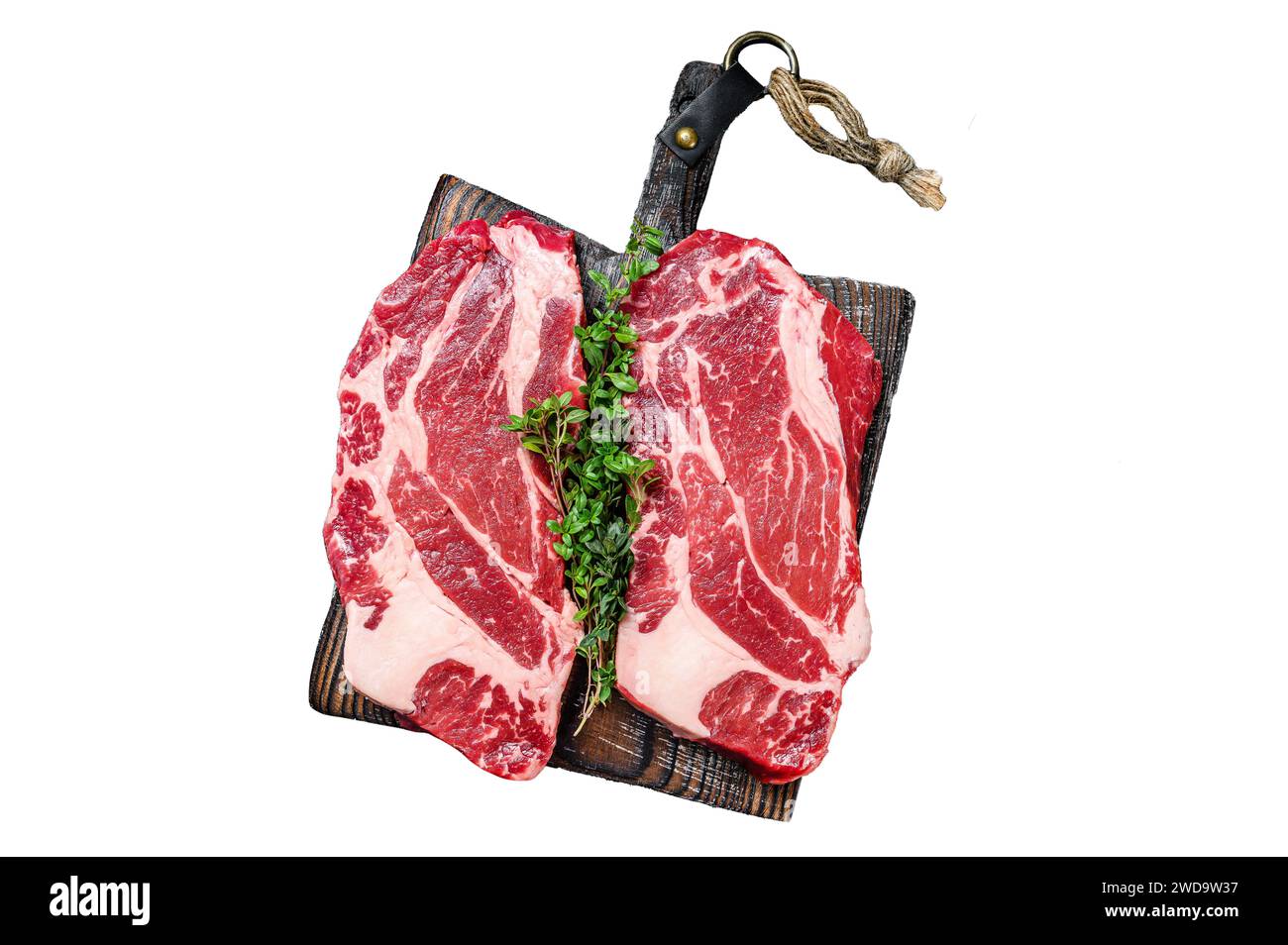 Raw chuck eye roll steaks premium beef meat on a cutting board ...