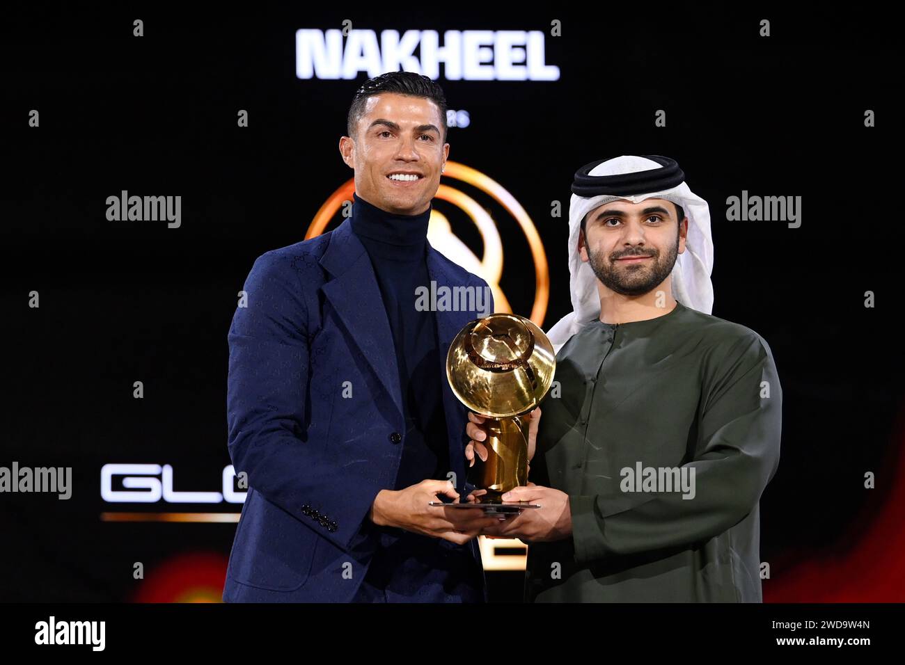 Cristiano Ronaldo, left, receives the "Maradona award", at the Globe ...