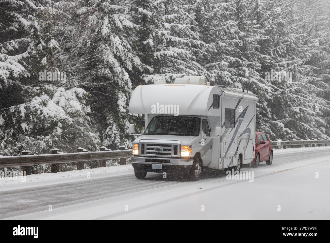 RV driving on fresh snow after a rare winter storm brought snow to the ... RV driving on fresh snow after a rare winter storm brought snow to the ...